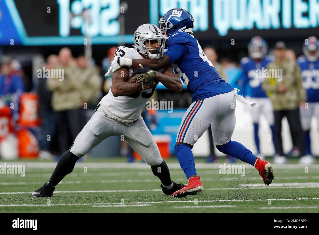 Las Vegas Raiders tight end Darren Waller (83) attempts to get past New ...