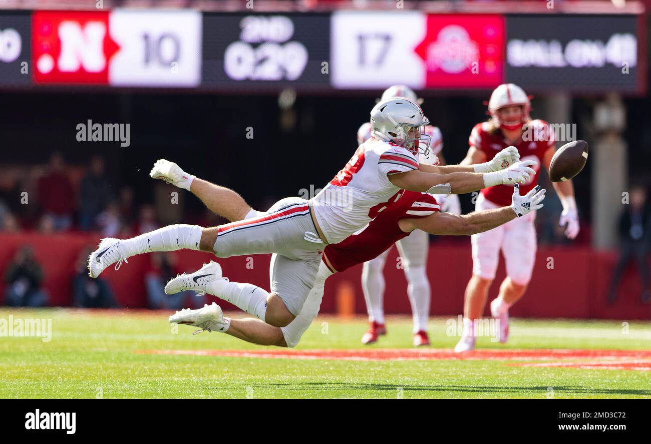 Nebraska's JoJo Domann, obscured behind, tips away a pass intended for ...