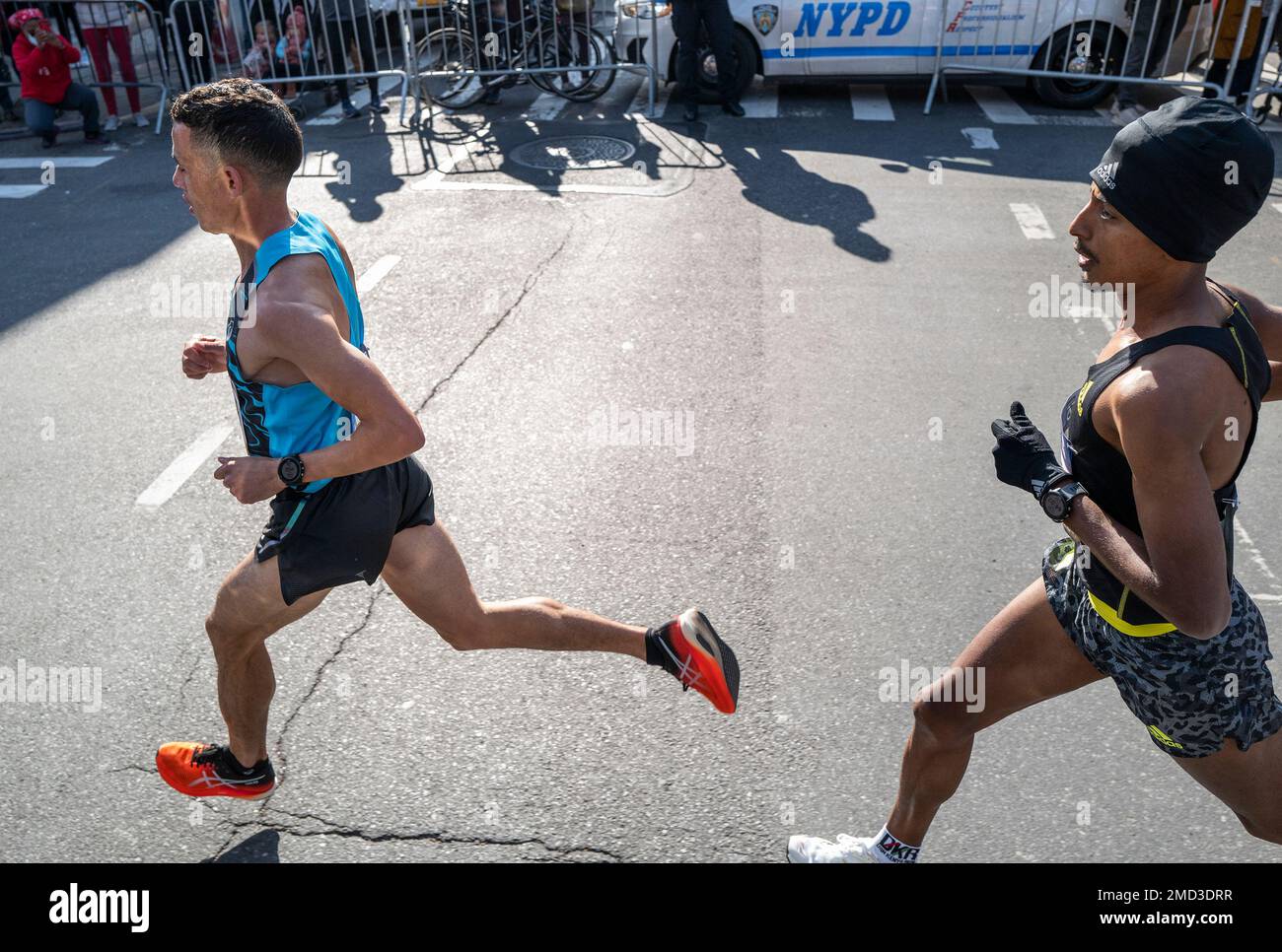 Mohamed El Aaraby, of Morrocco, left, and Eyob Faniel, of Italy, lead ...