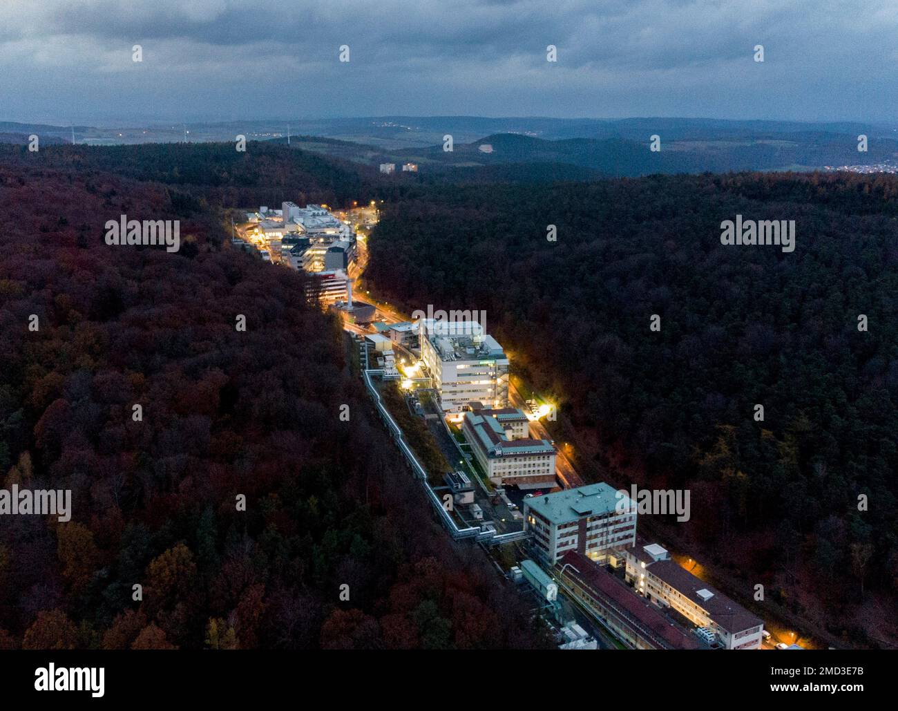 Lights burn around the main building of the BioNTech manufacturing ...