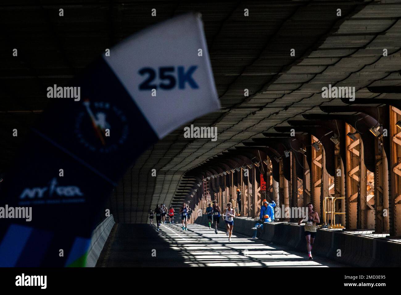 Runners cross the Ed Koch Queensboro Bridge during the New York City ...