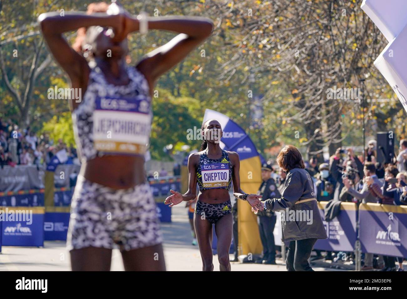 Viola Cheptoo of Kenya crosses the finish line second in the women's division of the New York ...