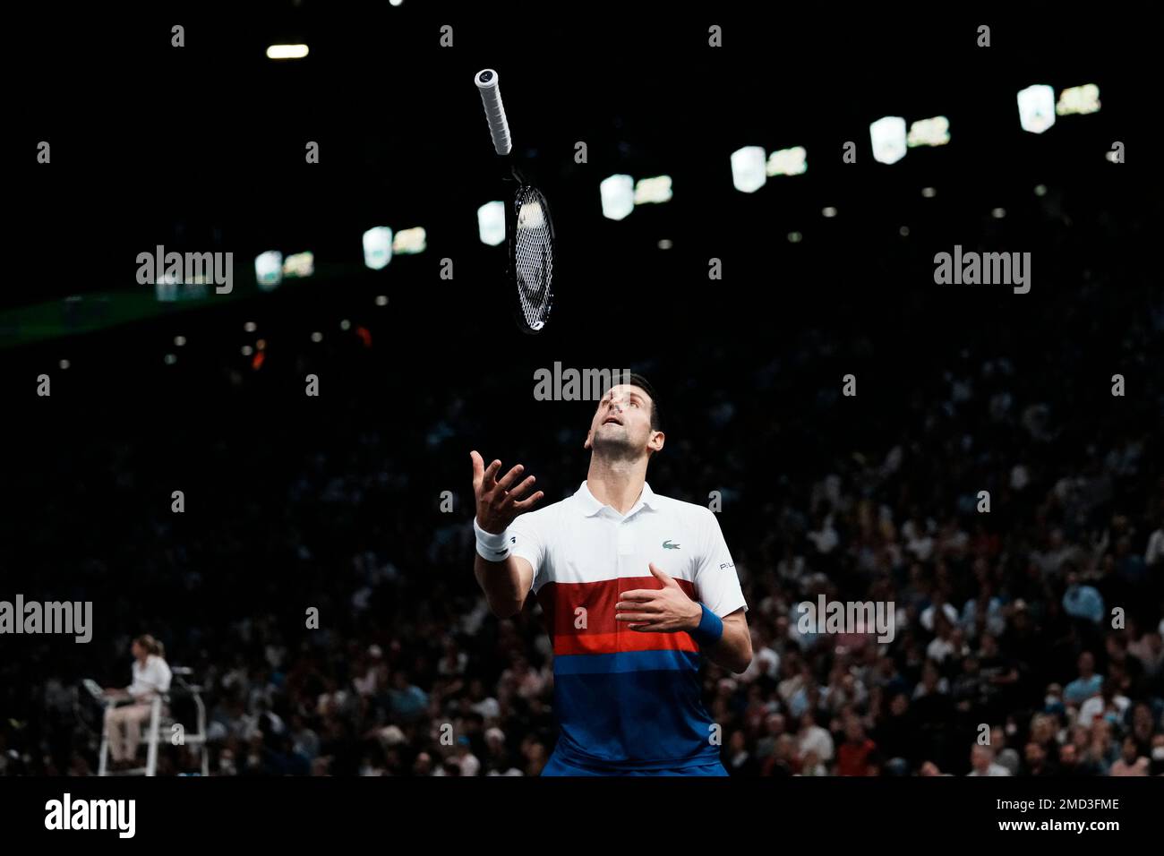 Serbia's Novak Djokovic throws his racket as he plays Russia's Daniil ...