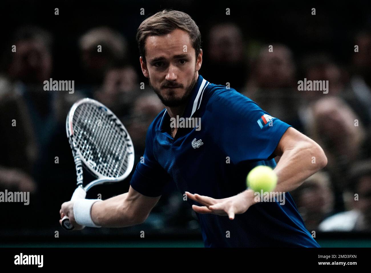 Russia's Daniil Medvedev returns the ball to Serbia's Novak Djokovic during the men's final ...