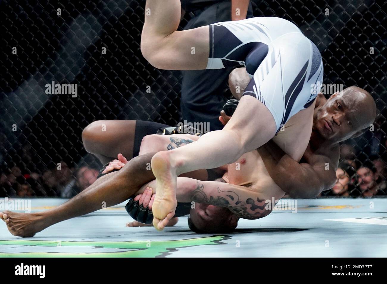 Kamaru Usman, right, grapples with Colby Covington during a ...