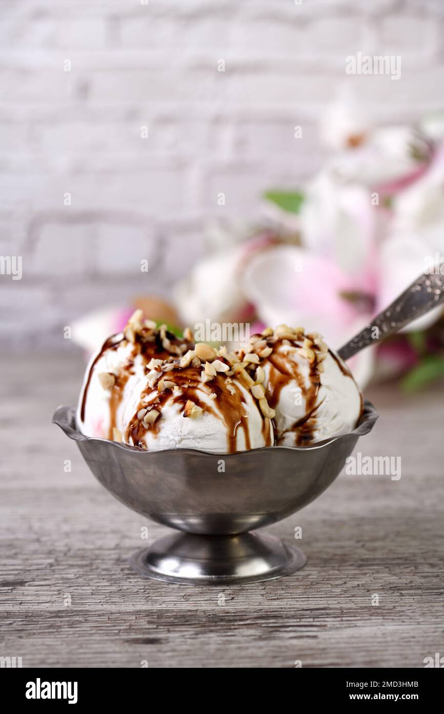 Summer cold dessert - three balls plombir ice cream with chocolate ...