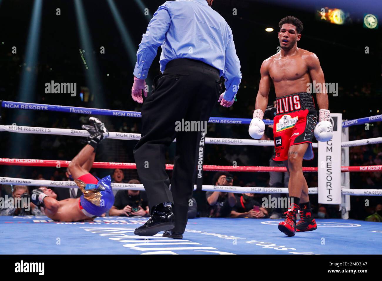 Elvis Rodriguez, right, of the Dominican Republic, knocks down Juan ...