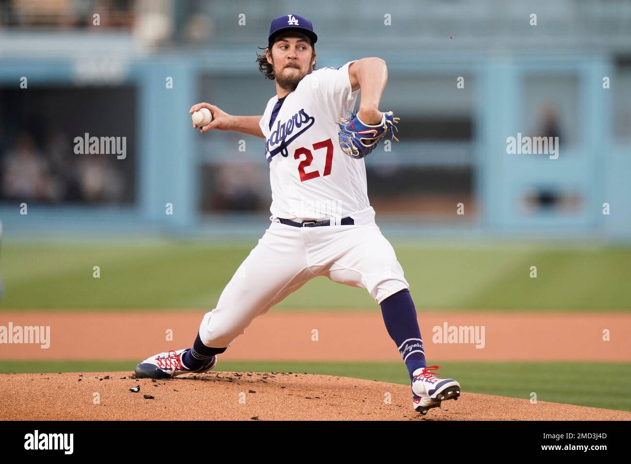 FILE - Los Angeles Dodgers starting pitcher Trevor Bauer throws against ...