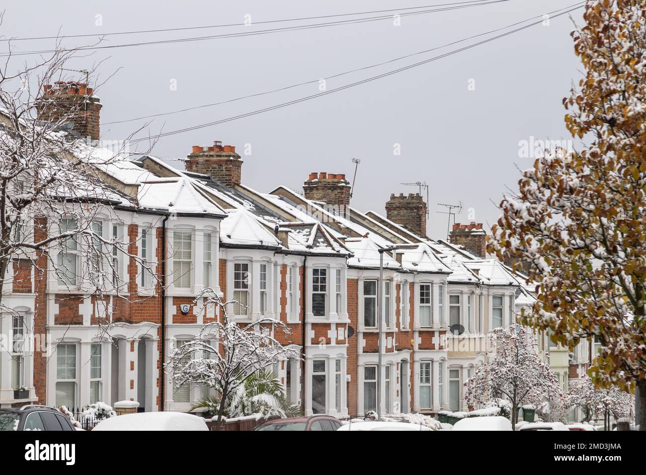 LONDON, UK - 12TH DECEMBER 22: Residential houses covered in snow down ...