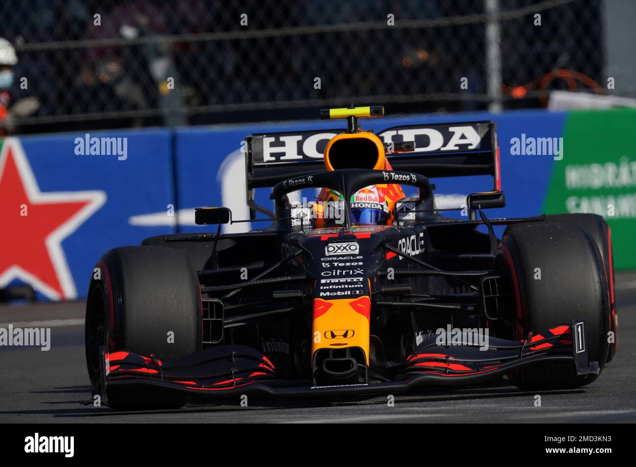 Red Bull driver Sergio Perez, of Mexico, drives his car during the qualifying run of the Formula ...