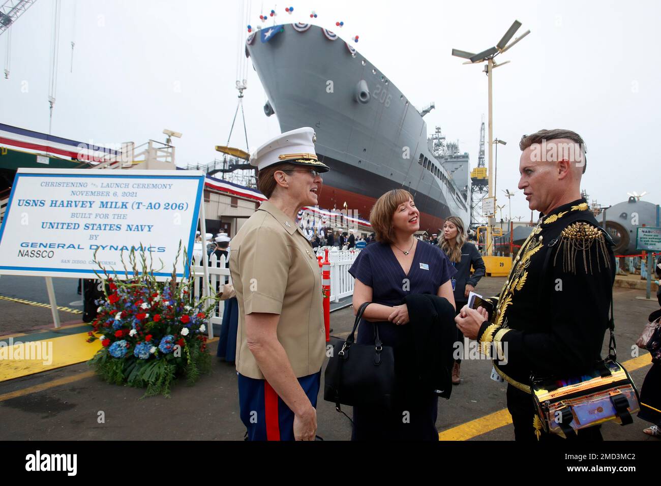 USMC Colonel Alison Thompson, left, talks with Jenn Onofrio, center, a ...