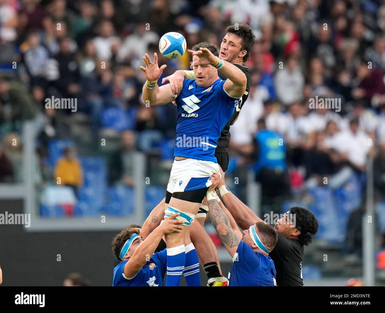 Italy's Abraham Steyn, and New Zealand's Josh Lord, vie for the ball ...