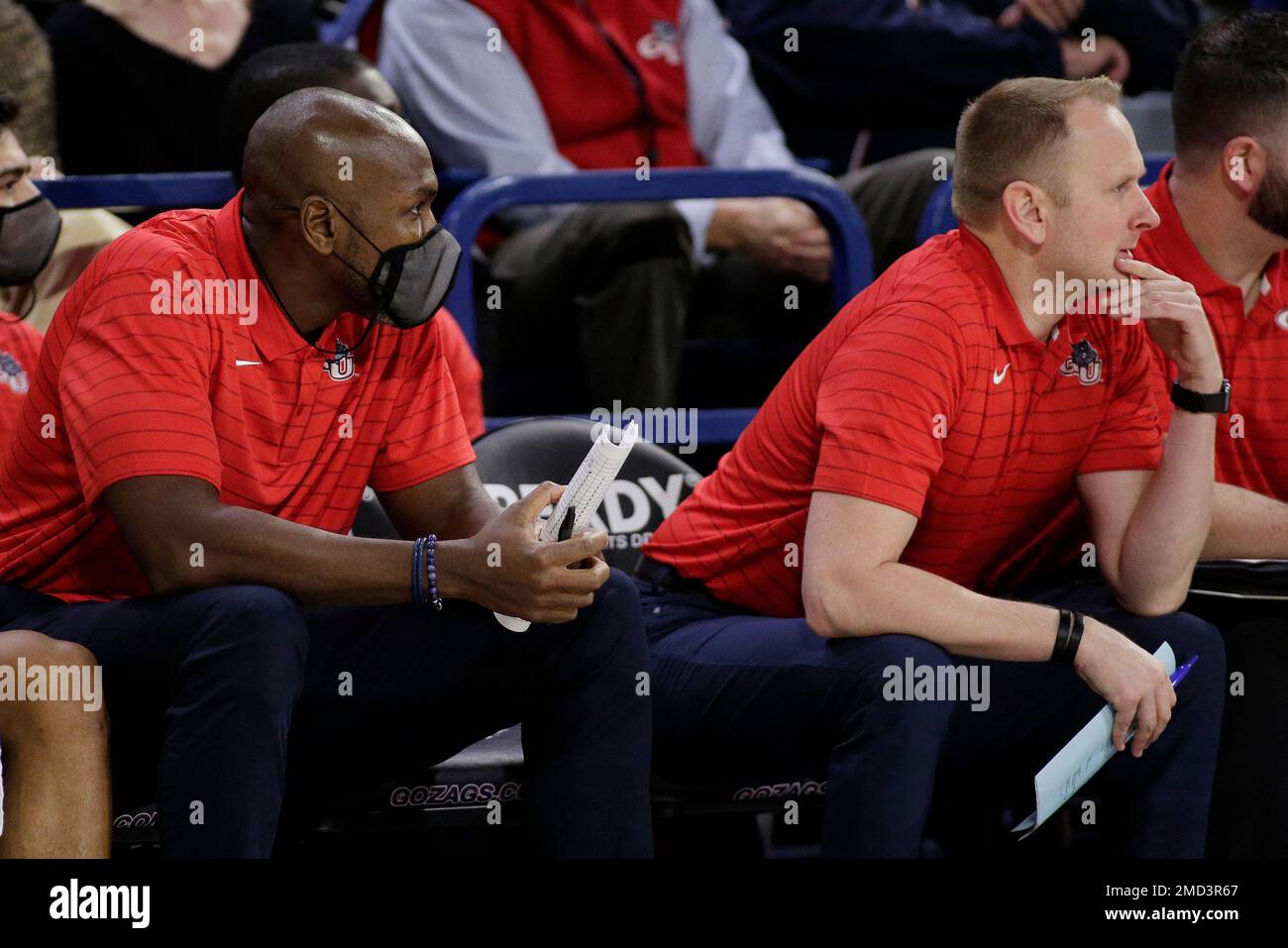 Gonzaga assistant coach Roger Powell Jr., left, and assistant coach Stephen Gentry watch the ...