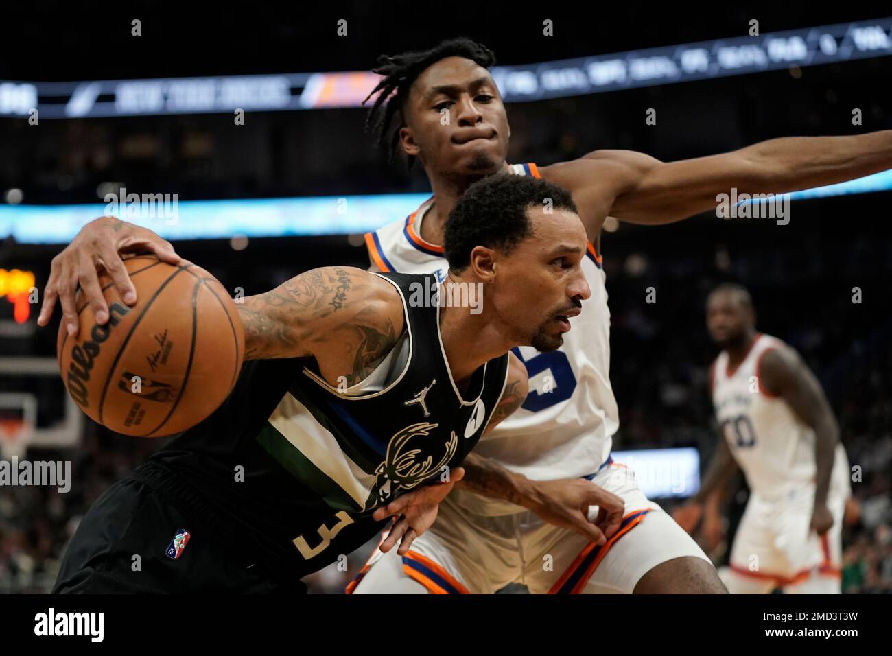 Milwaukee Bucks' George Hill drives past =ax5= during the second half ...