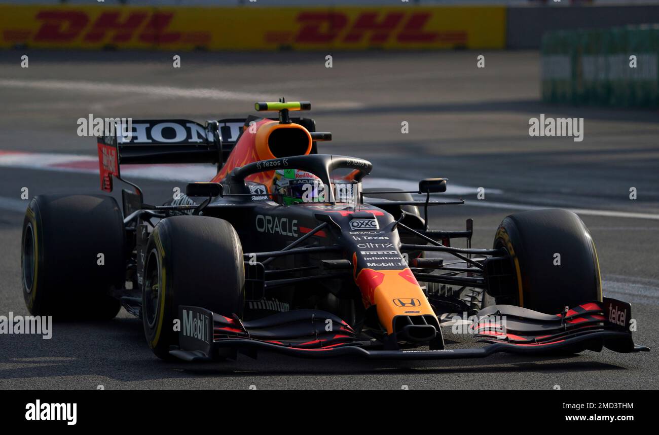 Formula One Red Bull driver Sergio Perez, of Mexico, steers his car during a practice session ...