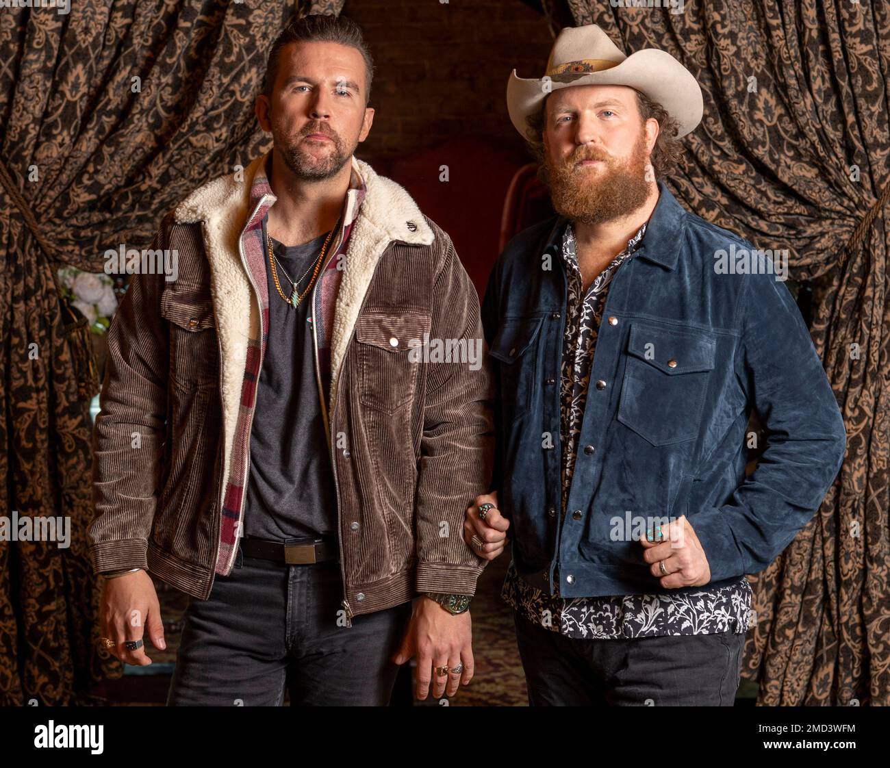 T.J. Osborne, left, and John Osborne, of Brothers Osbourne, pose for a portrait on Thursday, Nov ...