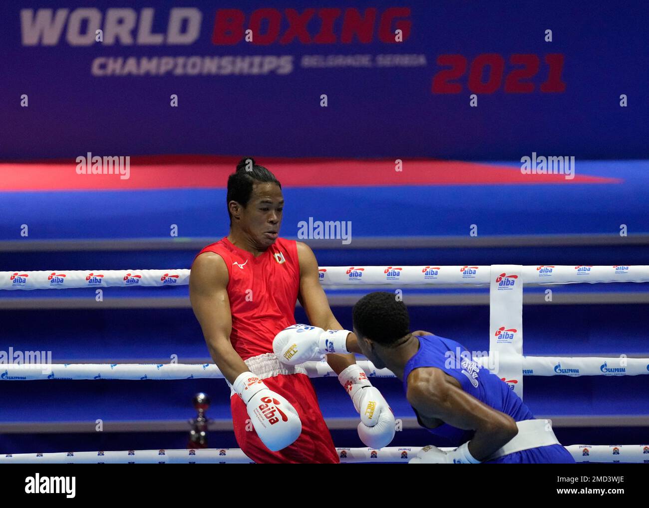 United States' Omari Jones, right, fights with Japan's Sewonrets ...