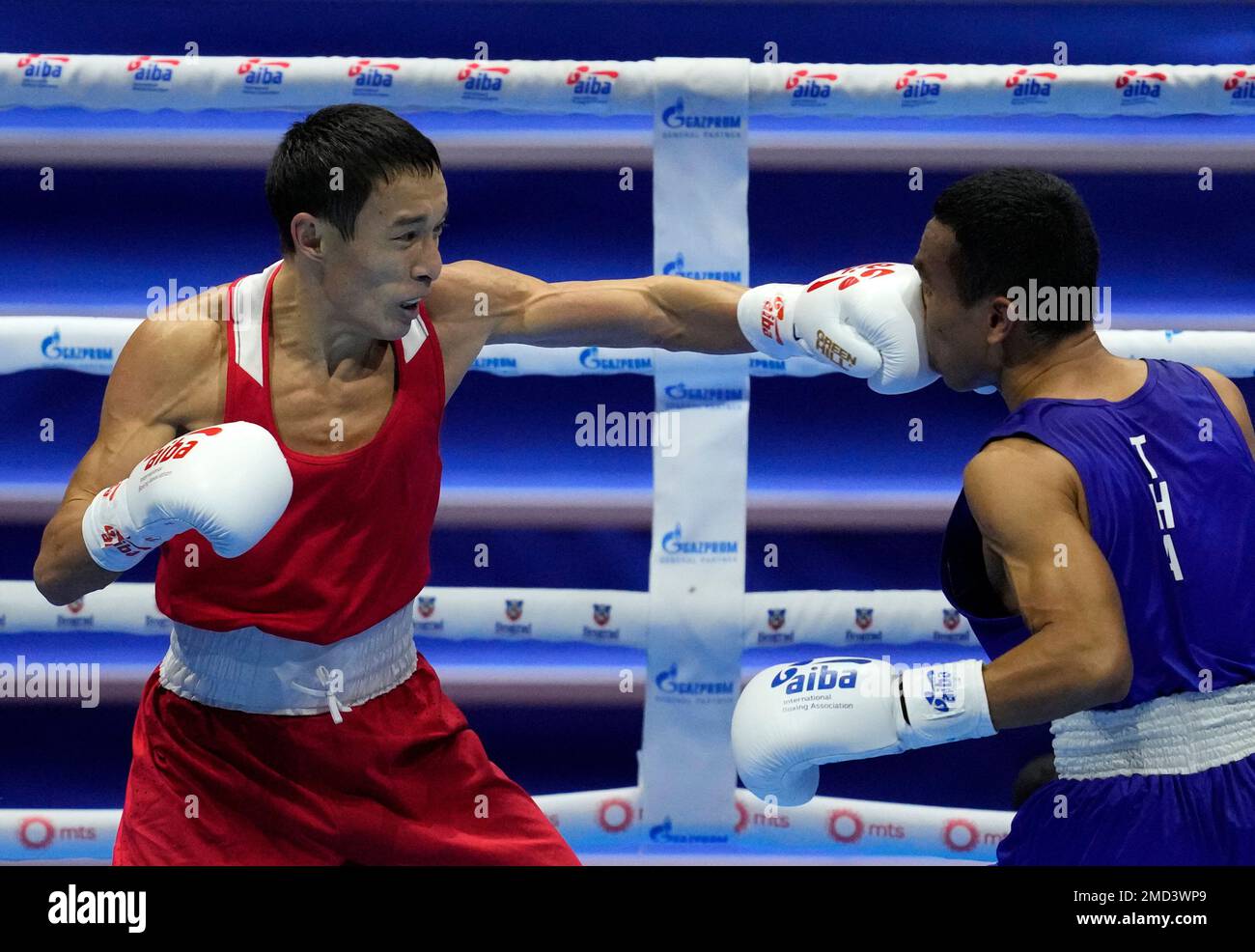 Kazakhstan's Temirtas Zhussupov, left, fights with Thailand's Wuttichai ...