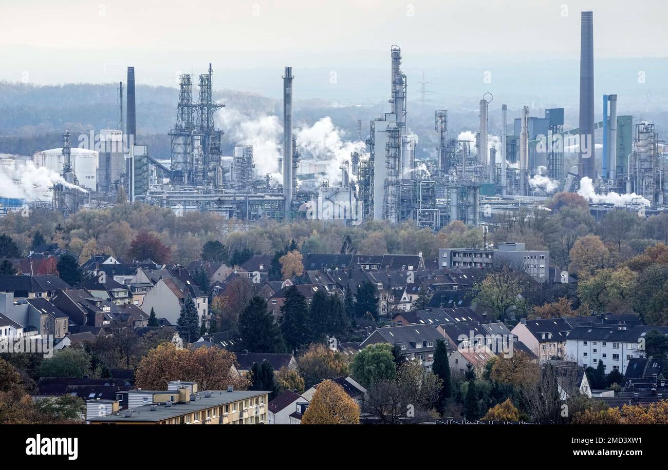 The BP oil refinery steams behind residential houses in Gelsenkirchen ...