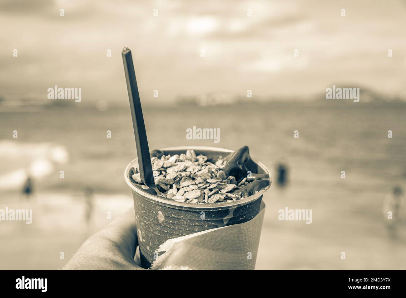 Brazilian superfood berry açaí in a mug as ice at Guanabara Bay ...