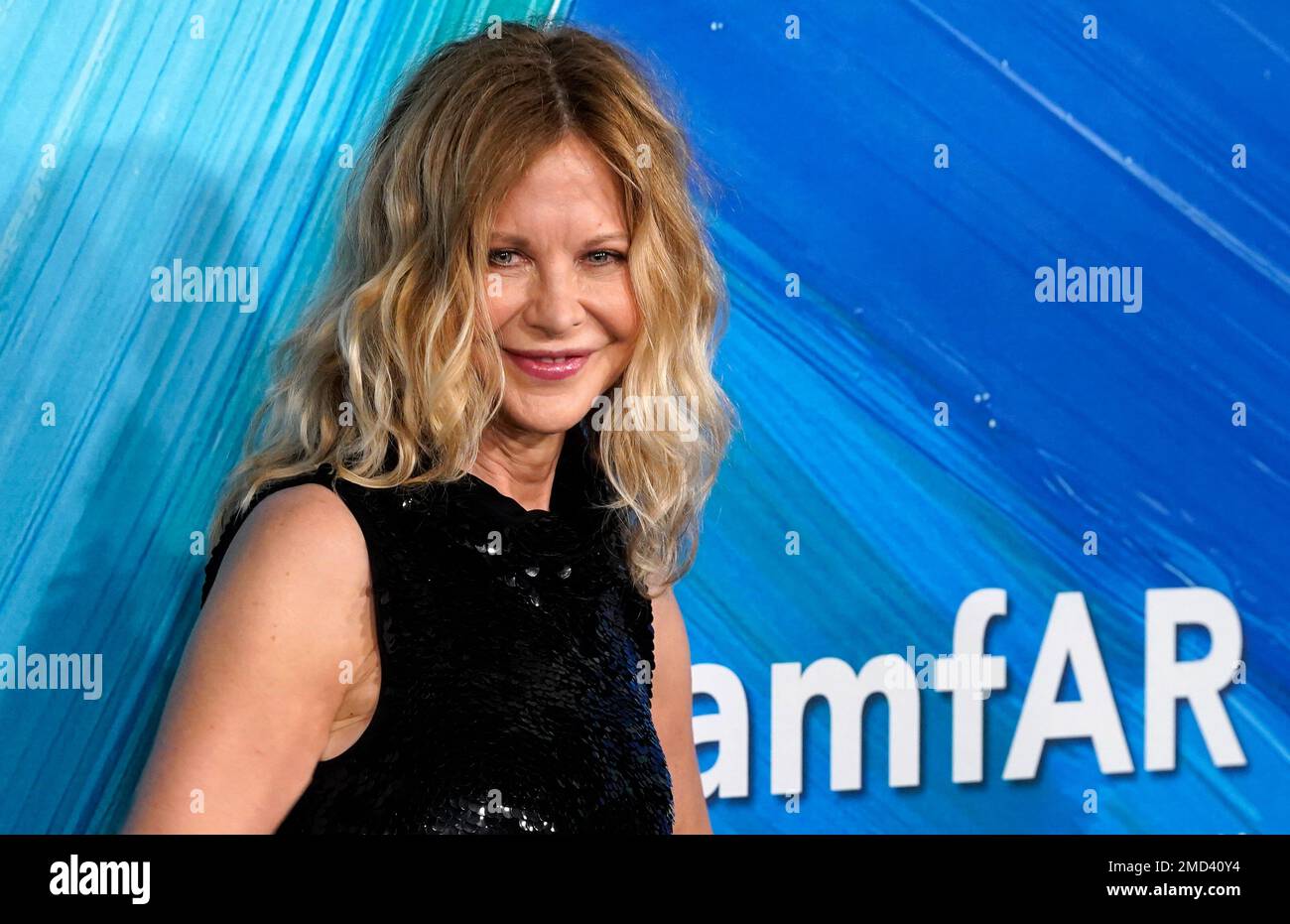 Actress Meg Ryan poses at the amfAR Gala, Thursday, Nov. 4, 2021, at ...