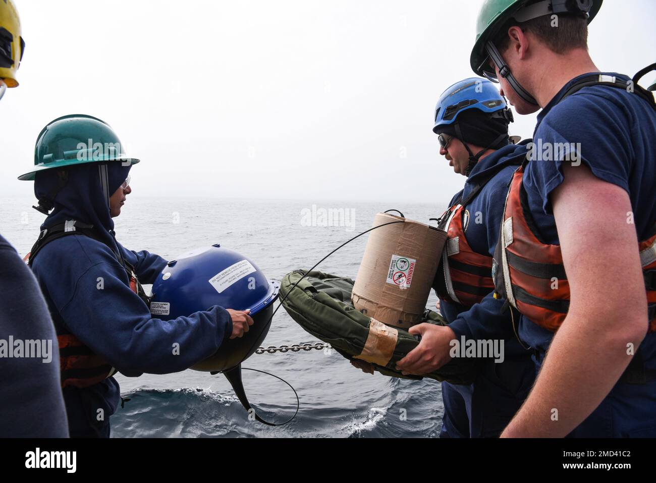 USCGC Oak (WLB 211) Seaman Jada Mento and Petty Officer 2nd Class Liam ...