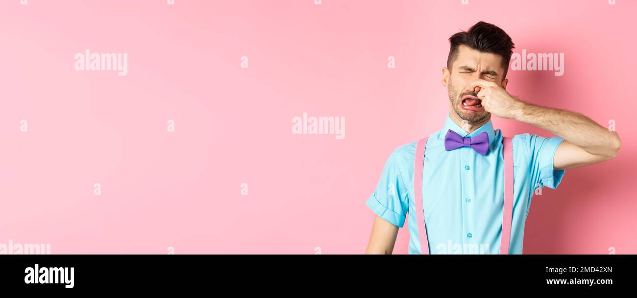 Image of man crying from disgusting smell, shut his nose from awful ...