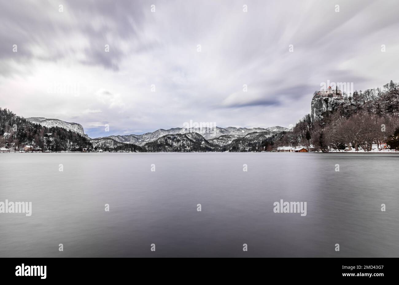 Long exposure with wide view of Lake Bled in Winter after a beautiful ...