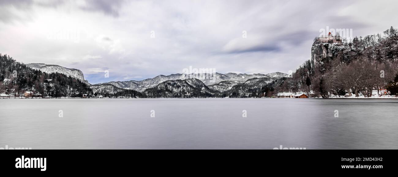 Long exposure with wide view of Lake Bled in Winter after a beautiful ...