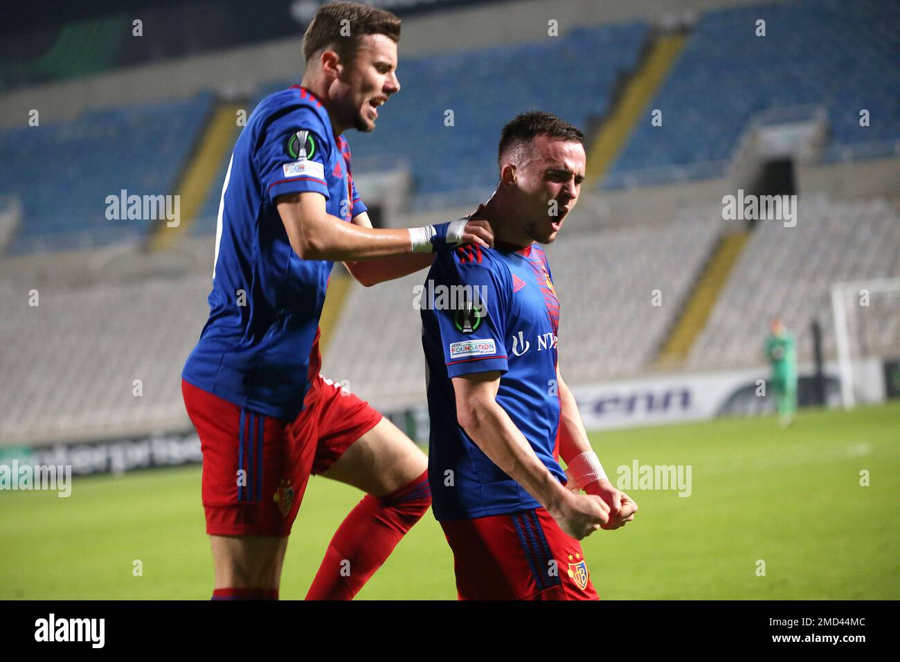 Basel's Liam Millar, right, celebrates his goal against Omonia during ...