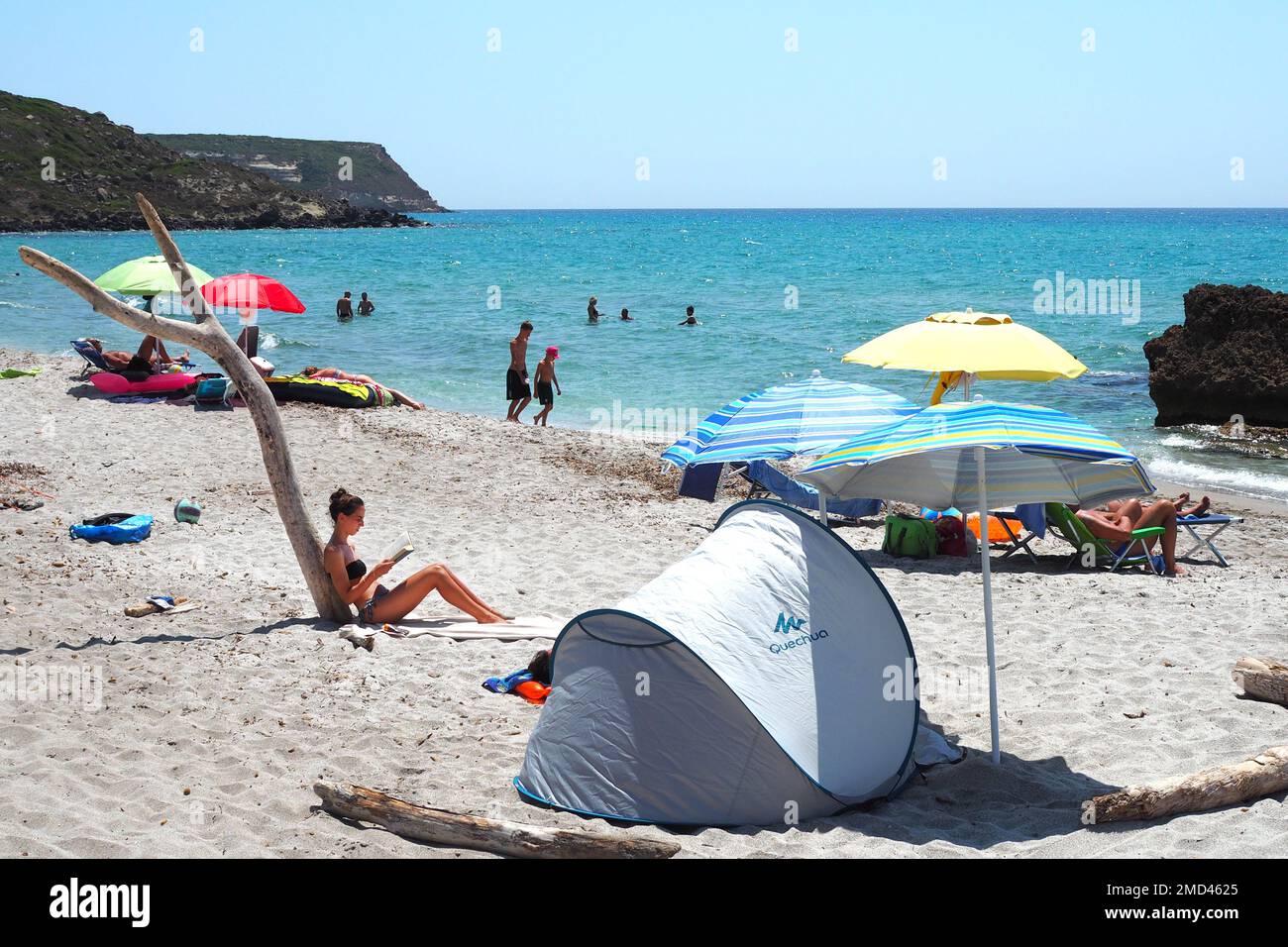 Italian woman sunbathing on beach hi-res stock photography and images ...