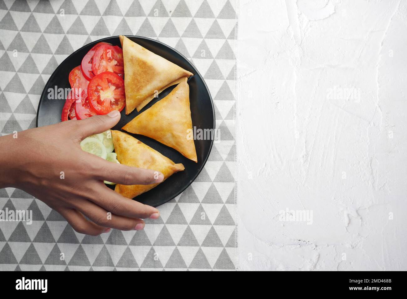 Samosa, an Indian popular street food, Close up Stock Photo - Alamy