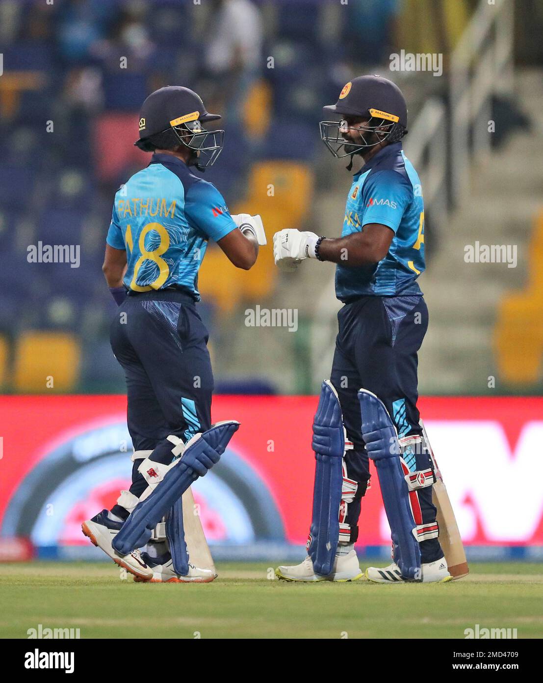 Sri Lanka's Pathum Nissanka, left, and Kusal Perera encourage each ...