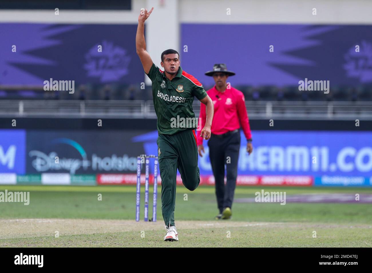 Bangladesh's Taskin Ahmed celebrates after taking the wicket of ...