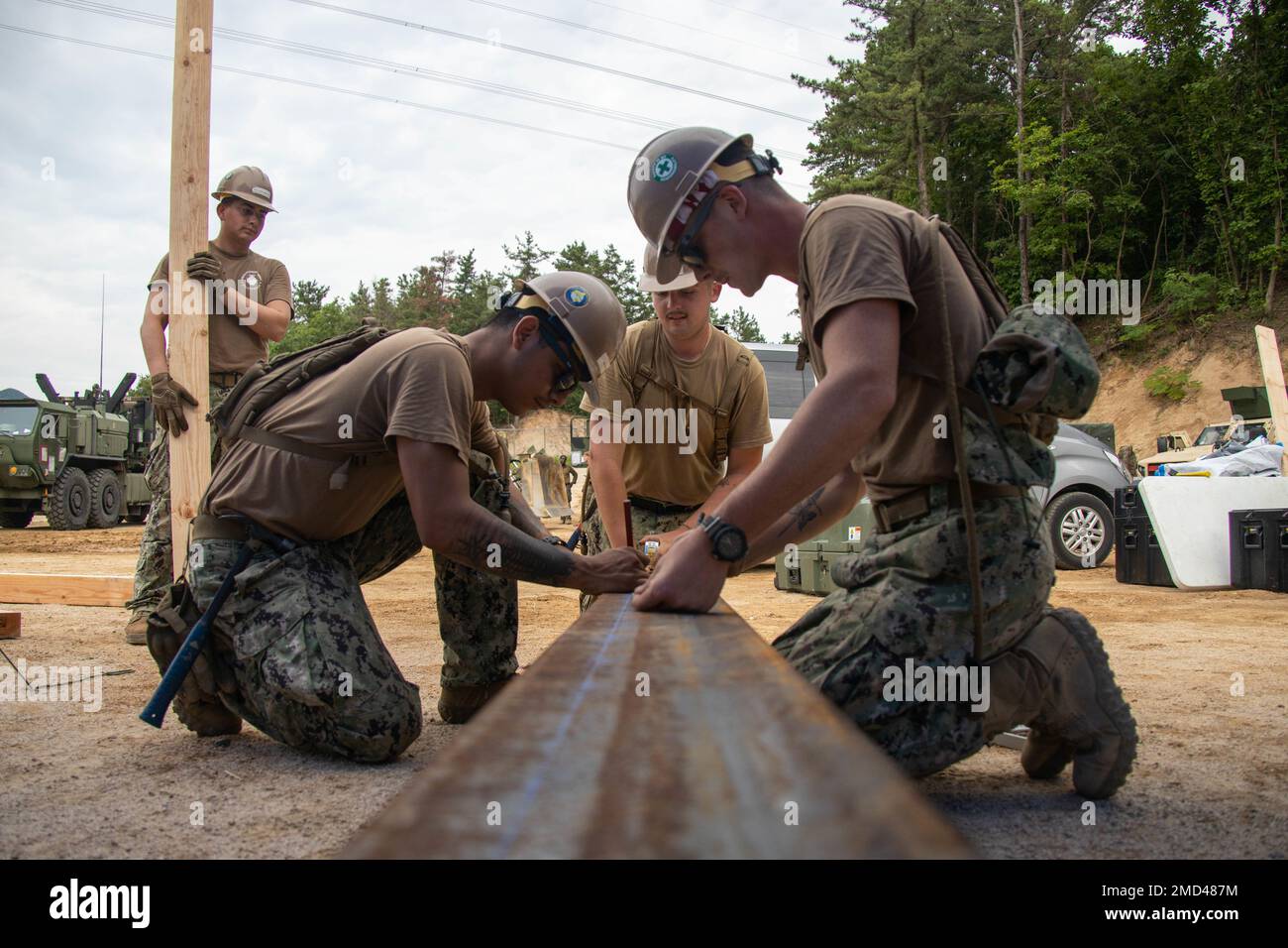 U.S. Navy constructionmen with Mobile Construction Battalion 4, 30th ...