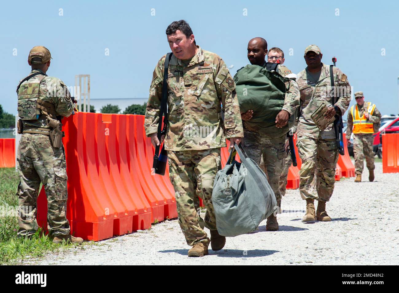 Team Dover members arrive at a simulated forward operating base during ...