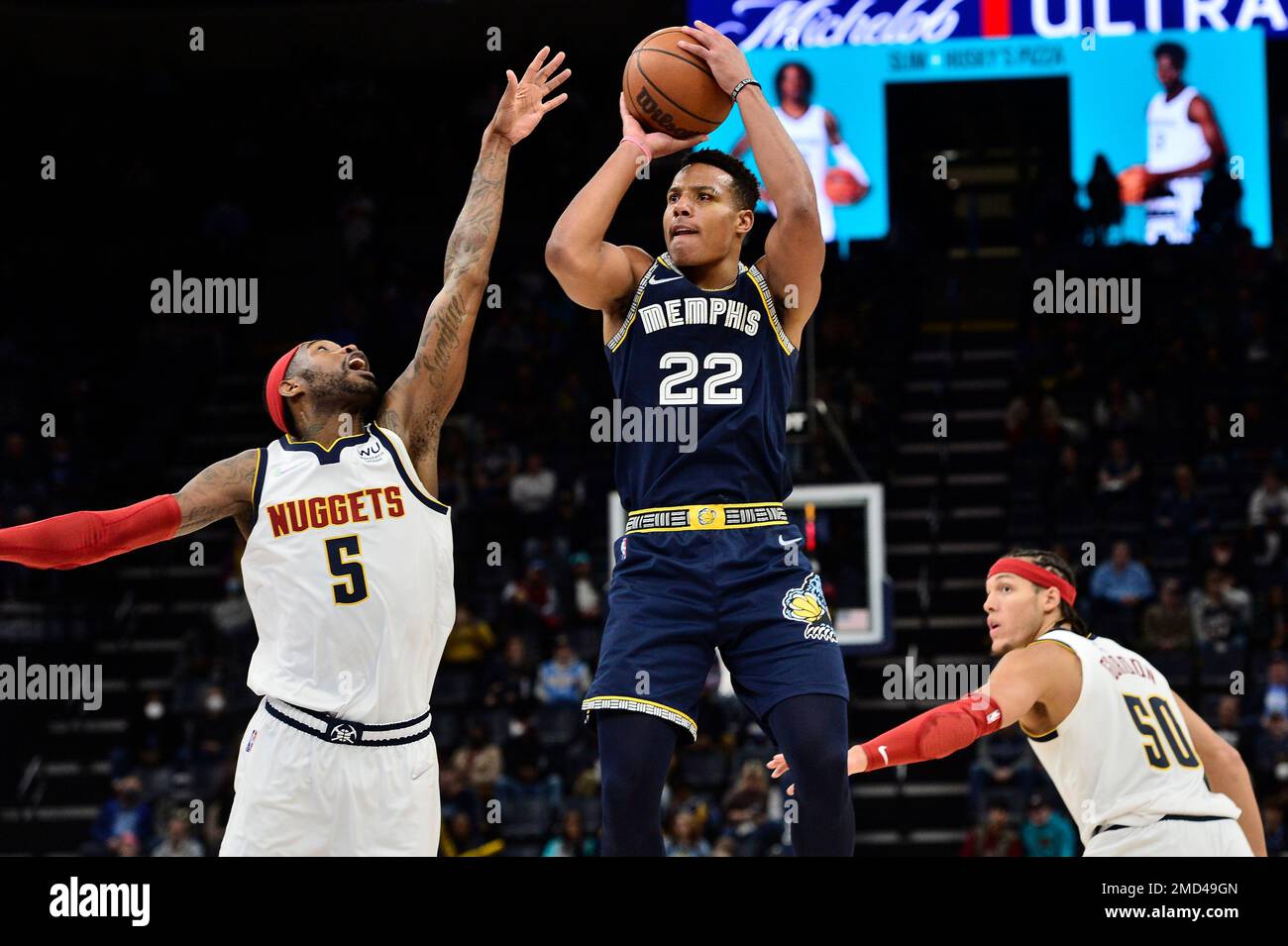 Memphis Grizzlies guard Desmond Bane (22) shoots against Denver Nuggets ...