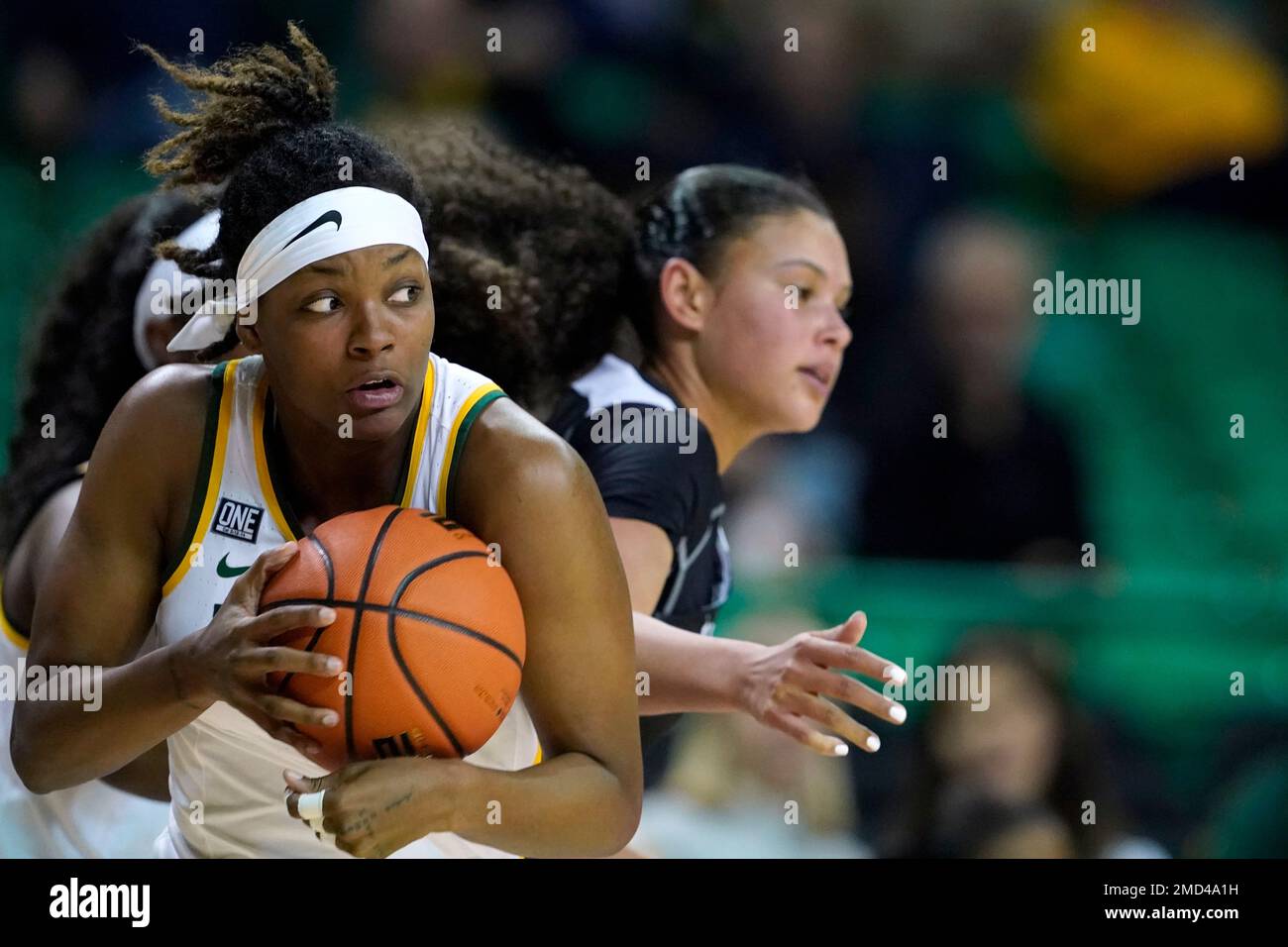 Baylor forward NaLyssa Smith, left, comes away with a steal against ...
