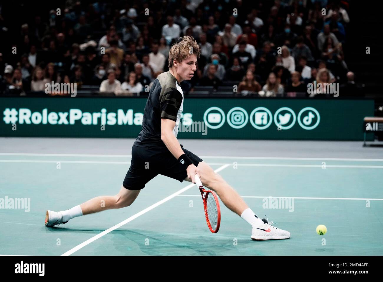 Ilya Ivashka of Belarus plays a return to Daniil Medvedev of Russia, at ...