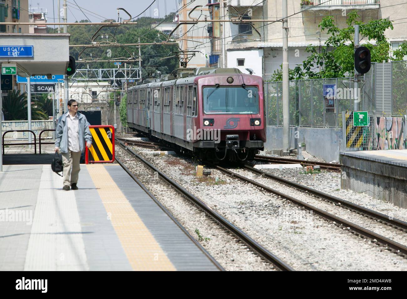 Trains circulating in the Erculano station in Naples Stock Photo - Alamy