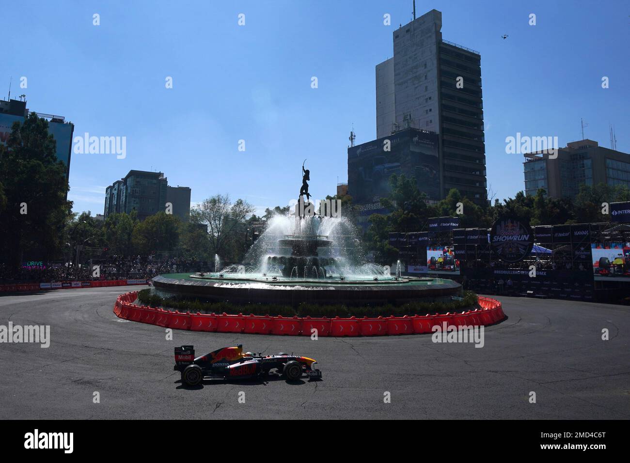 Mexican Formula One Red Bull driver Sergio "Checo" Pérez drives in an exhibition race along ...