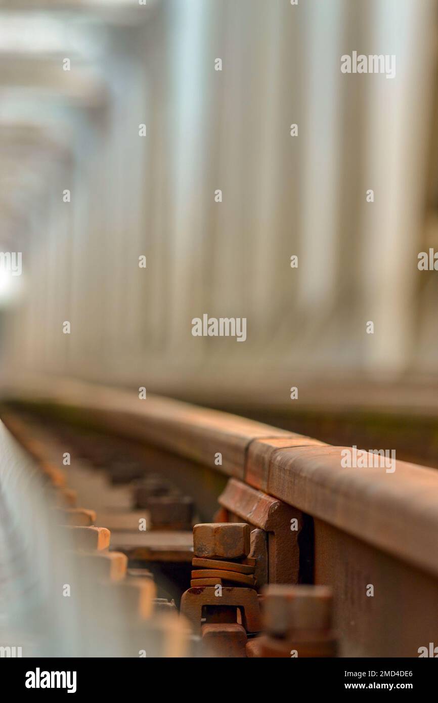 Railroad tracks, railway rail, close-up of a fastening bolt Stock Photo ...