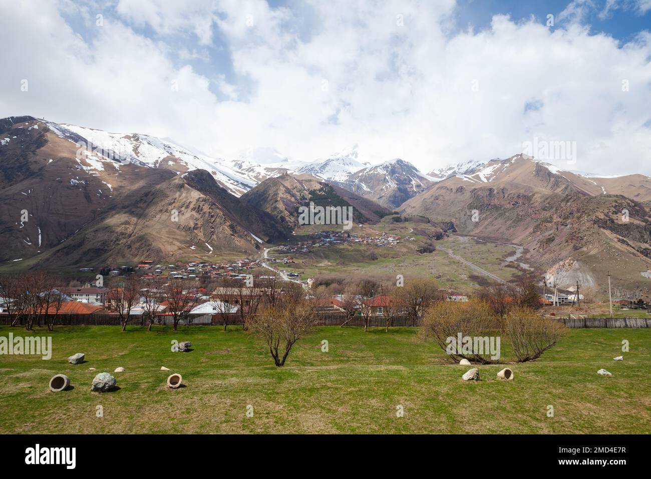 Stepantsminda landscape with Kazbegi mountains on a background ...