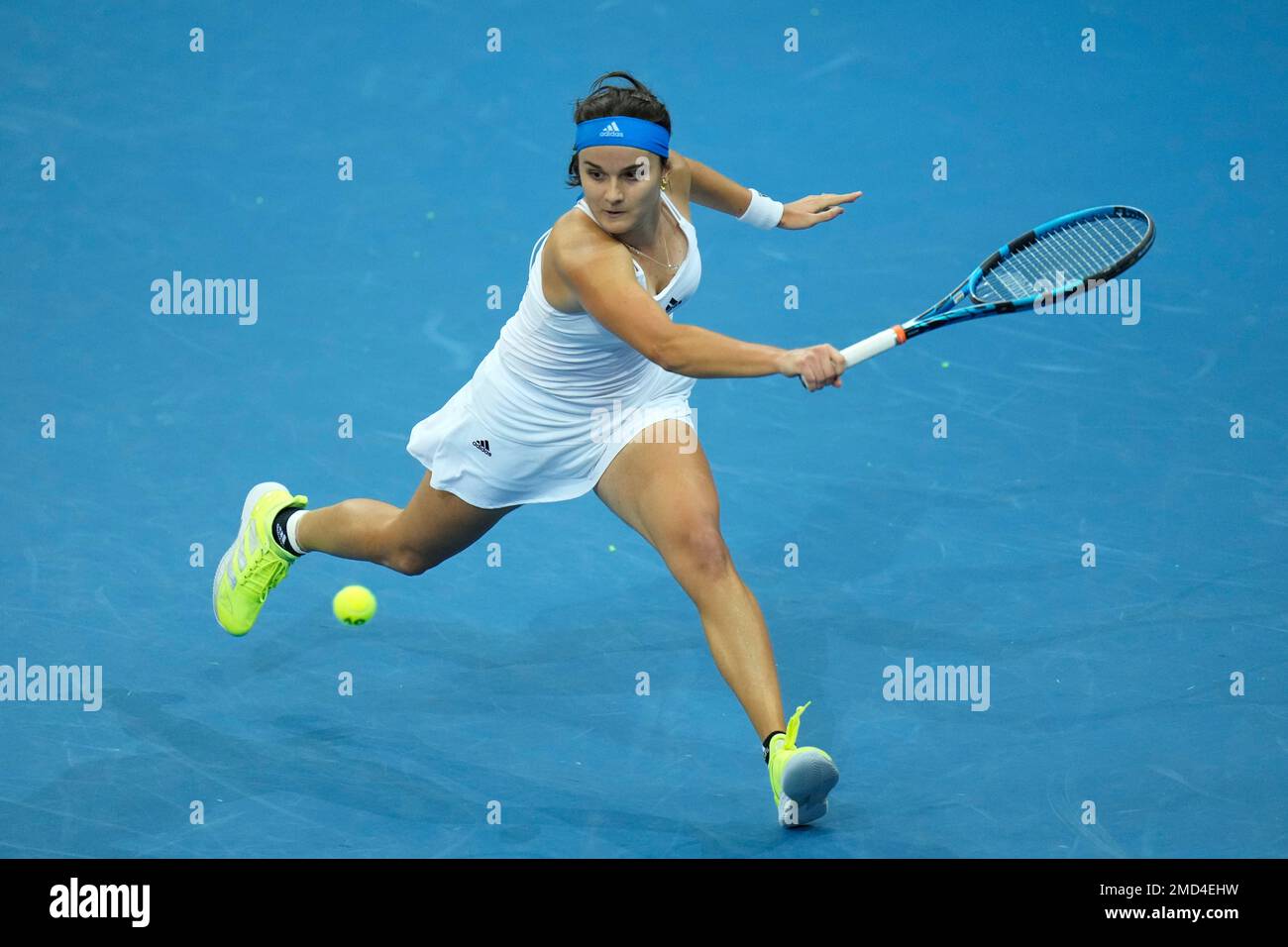 Clara Burel of France returns a ball to Russia's Ekaterina Alexandrova ...