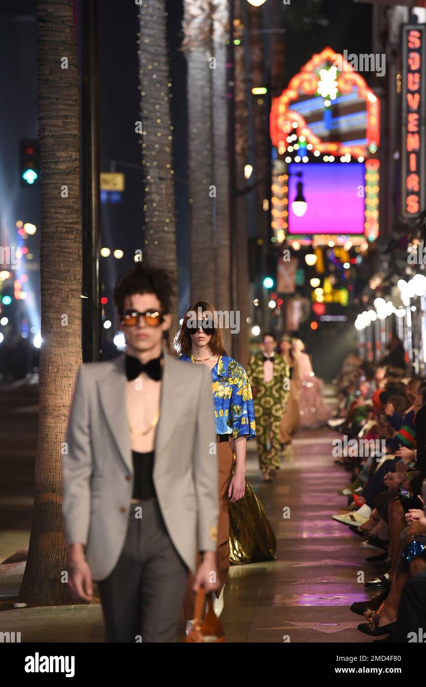 Models walk the runway at the Gucci "Love Parade" fashion show on ...