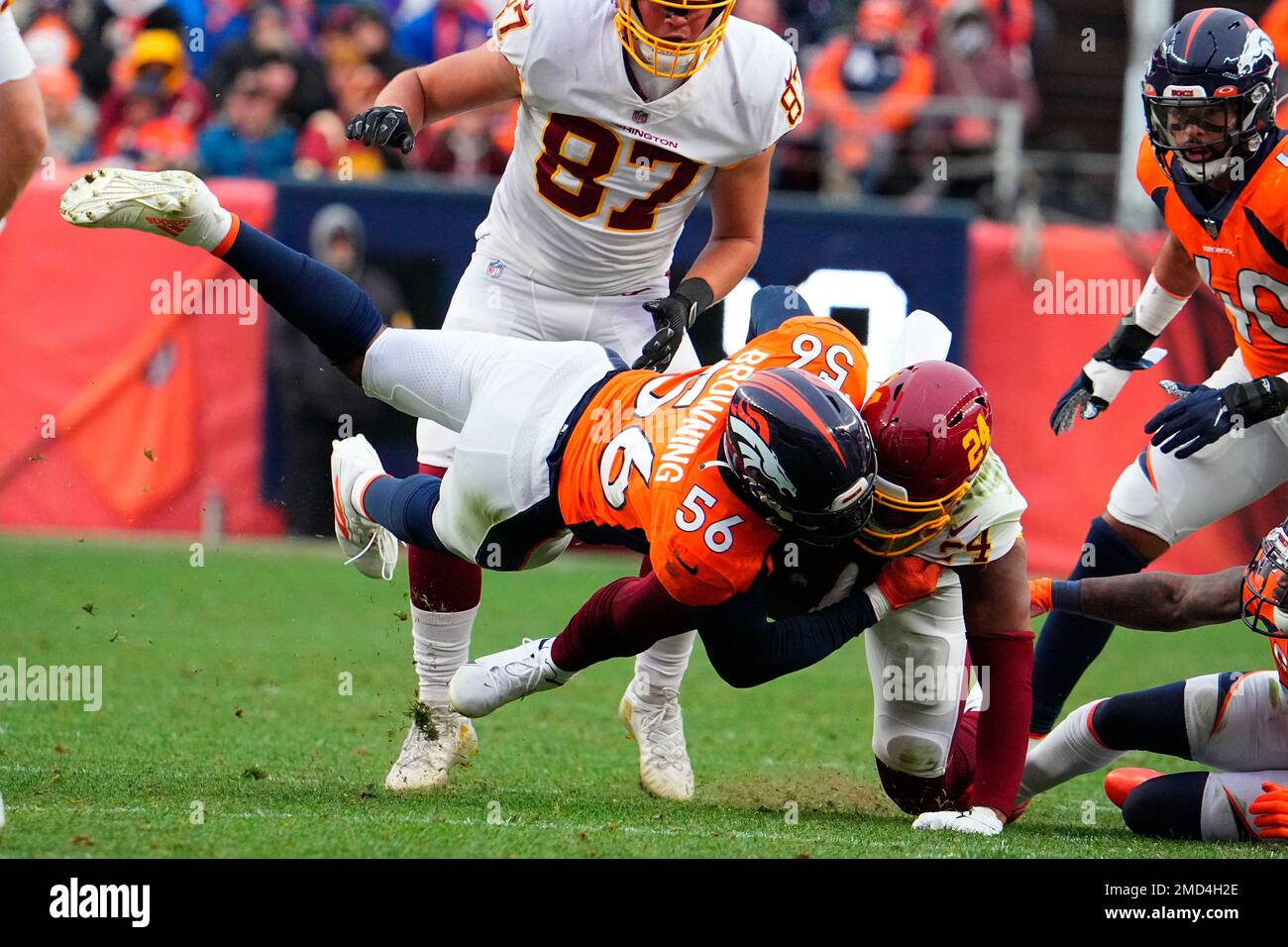 Denver Broncos linebacker Baron Browning (56) tackles against the ...