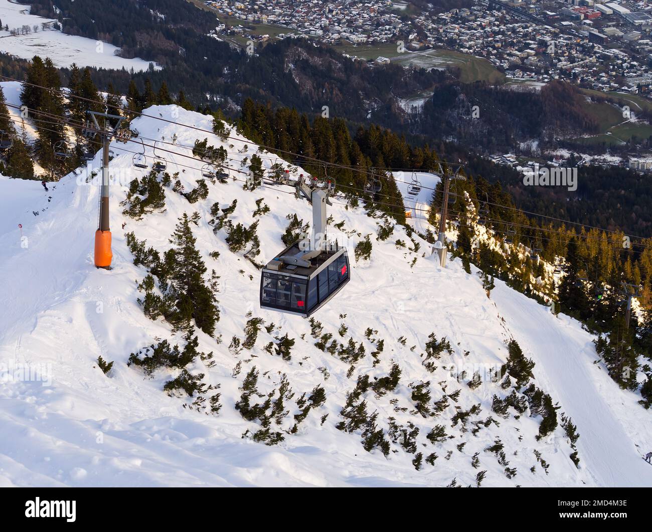 Cable car in alpine mountain Stock Photo - Alamy