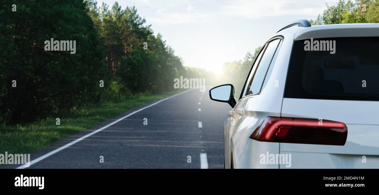Car driving on a summer road Stock Photo - Alamy