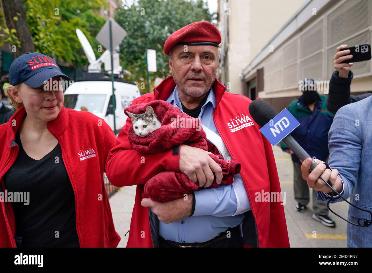 Mayoral candidate Curtis Sliwa arrives to vote with his wife Nancy ...