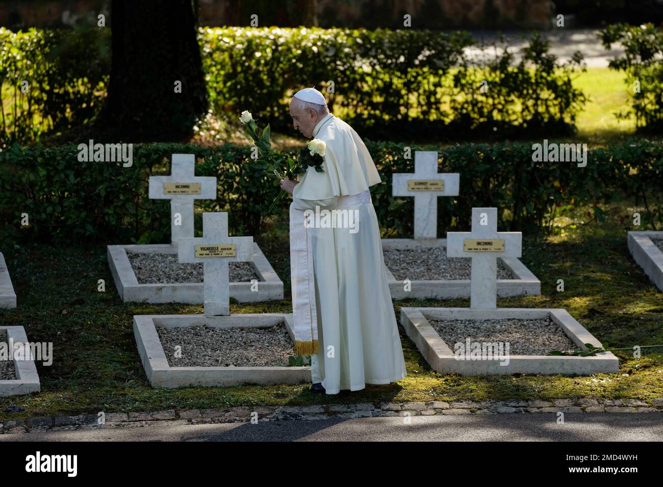 Pope Francis holds roses as he presides over a ceremony on the occasion ...